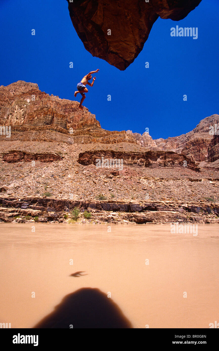 man jumping of cliff, Grand Canyon, Arizona Stock Photo - Alamy