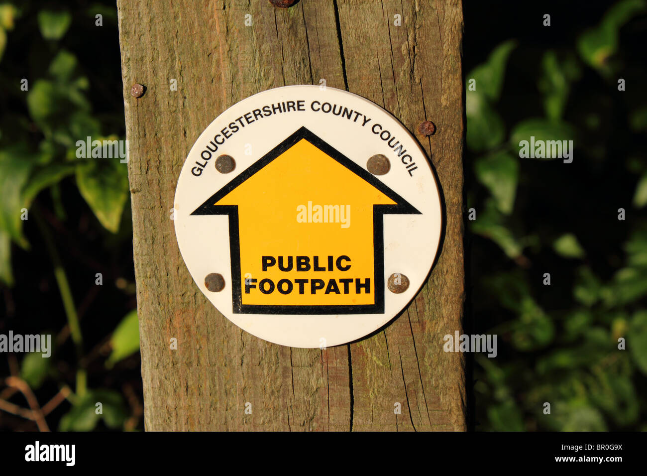Public footpath waymarker in the Cotswolds, Gloucestershire, England ...