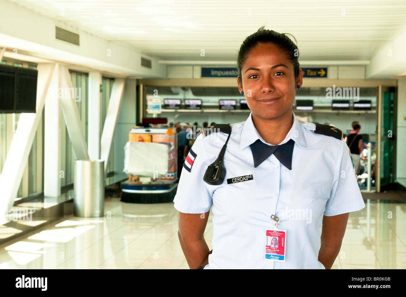 Costa Rican Police woman portrait outside the Juan Santamaria ...