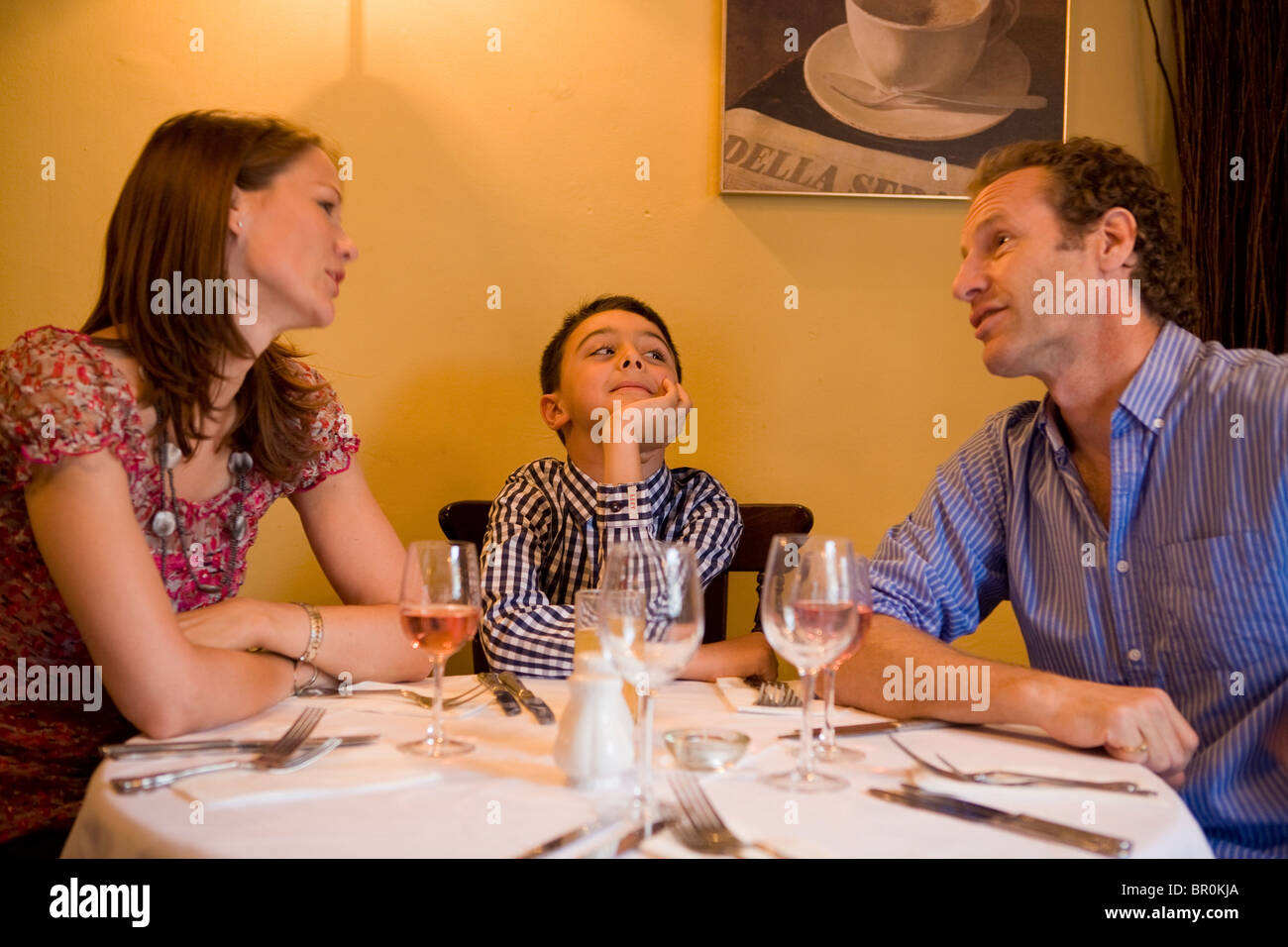 Family dining out in a restaurant Stock Photo - Alamy