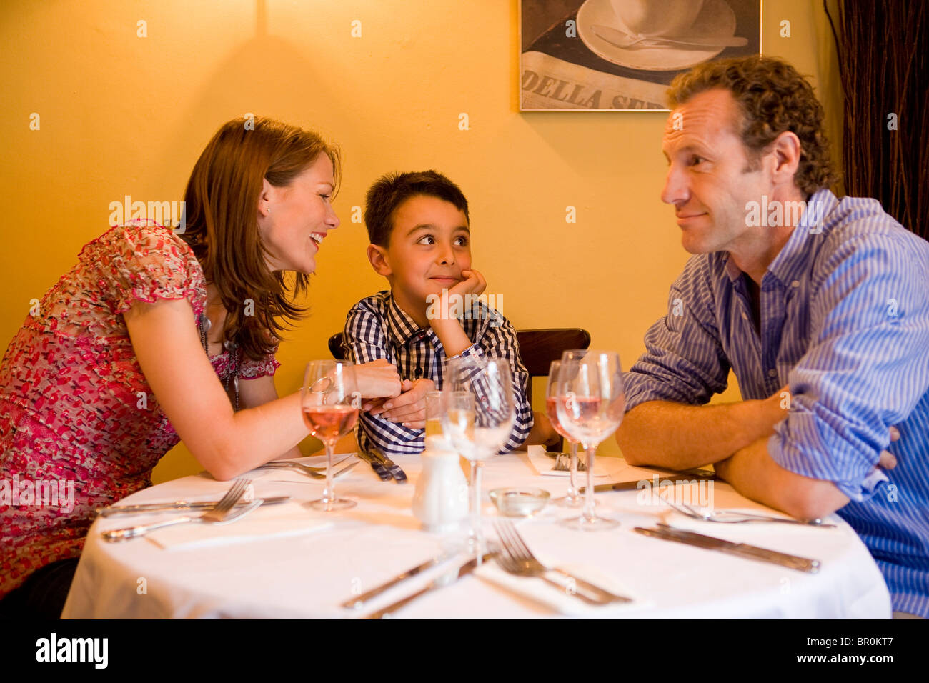 Family dining out in a restaurant Stock Photo - Alamy