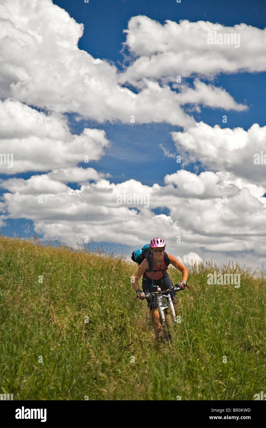 Jessica Reilly biking Deer Creek trail, Crested Butte, Colorado Stock ...