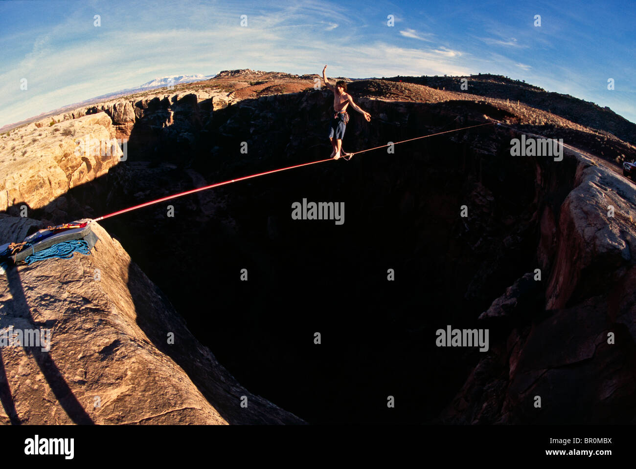 man slacklining, Utah Stock Photo - Alamy