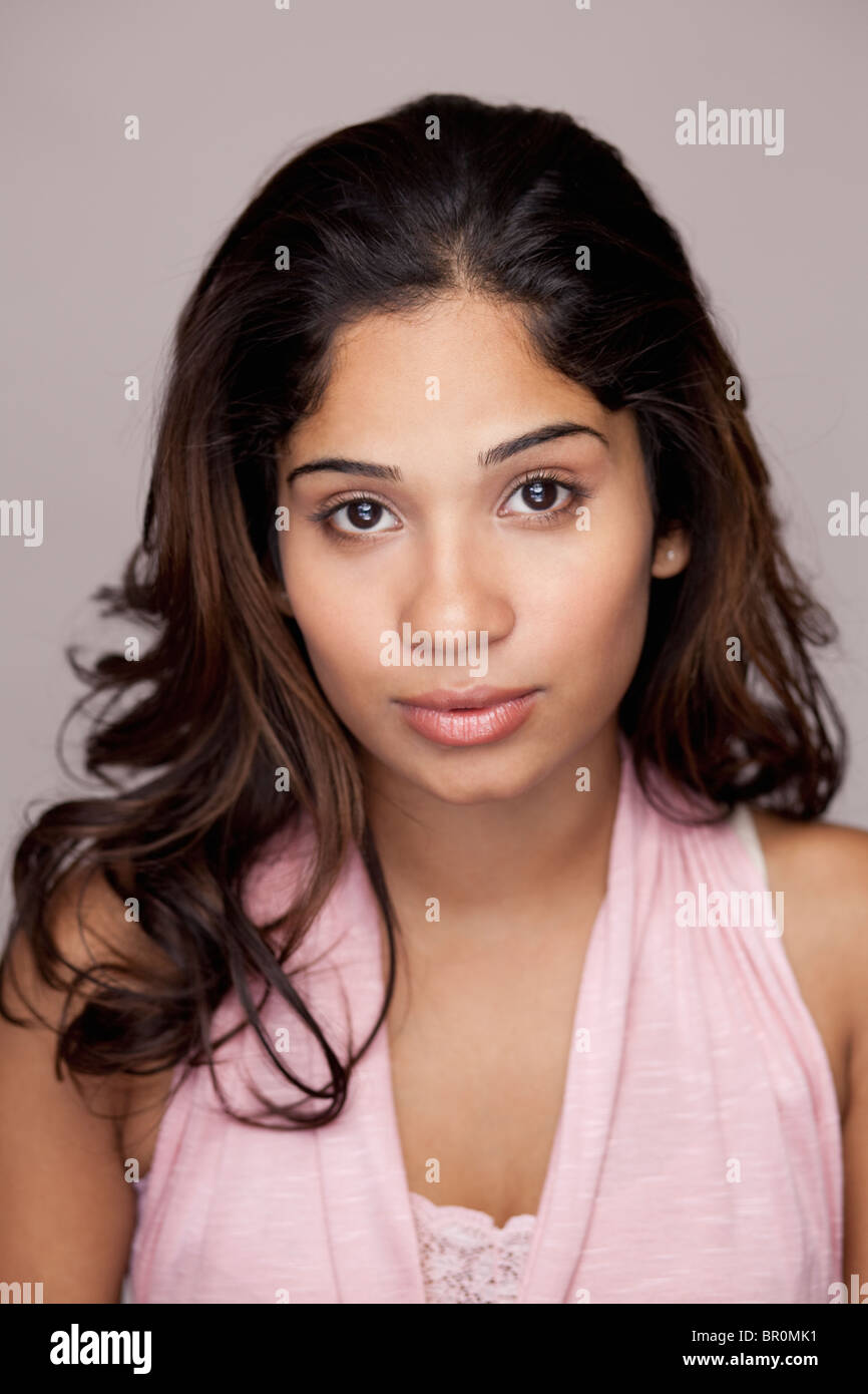 Serious Hispanic woman Stock Photo - Alamy