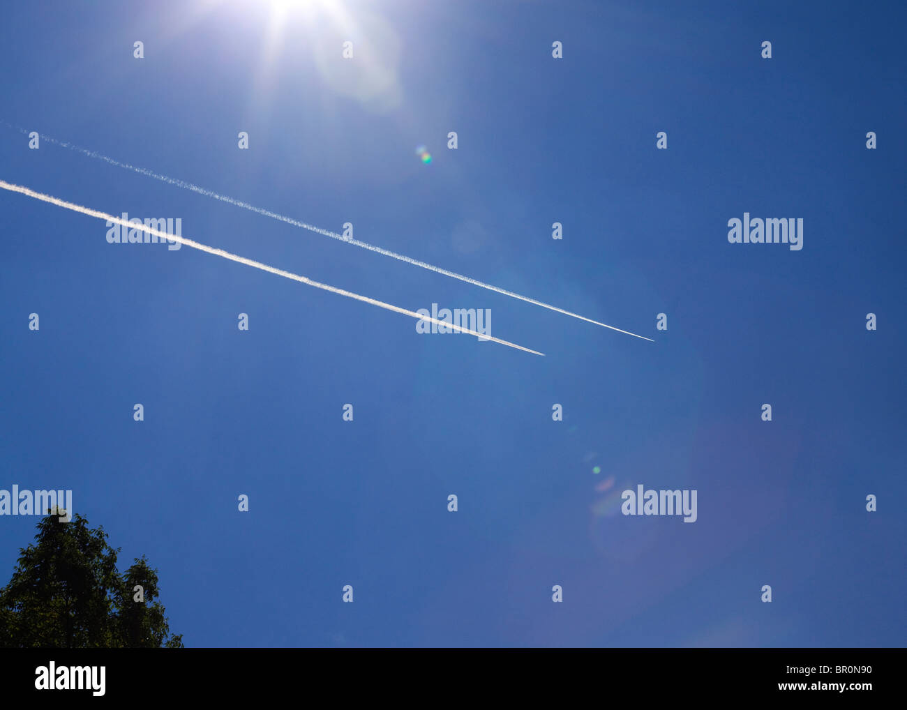 Blue contrails hi-res stock photography and images - Alamy