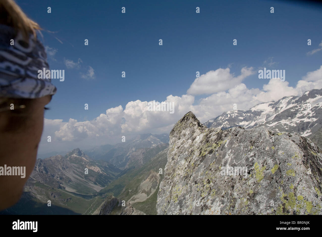 A boy wearing bandana hiking in Vanoise National Park, High Alps ...