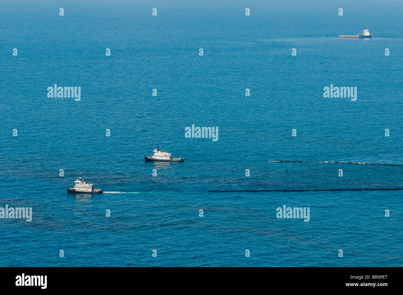 Oil skimming boats collecting oil three miles north of the source MC ...