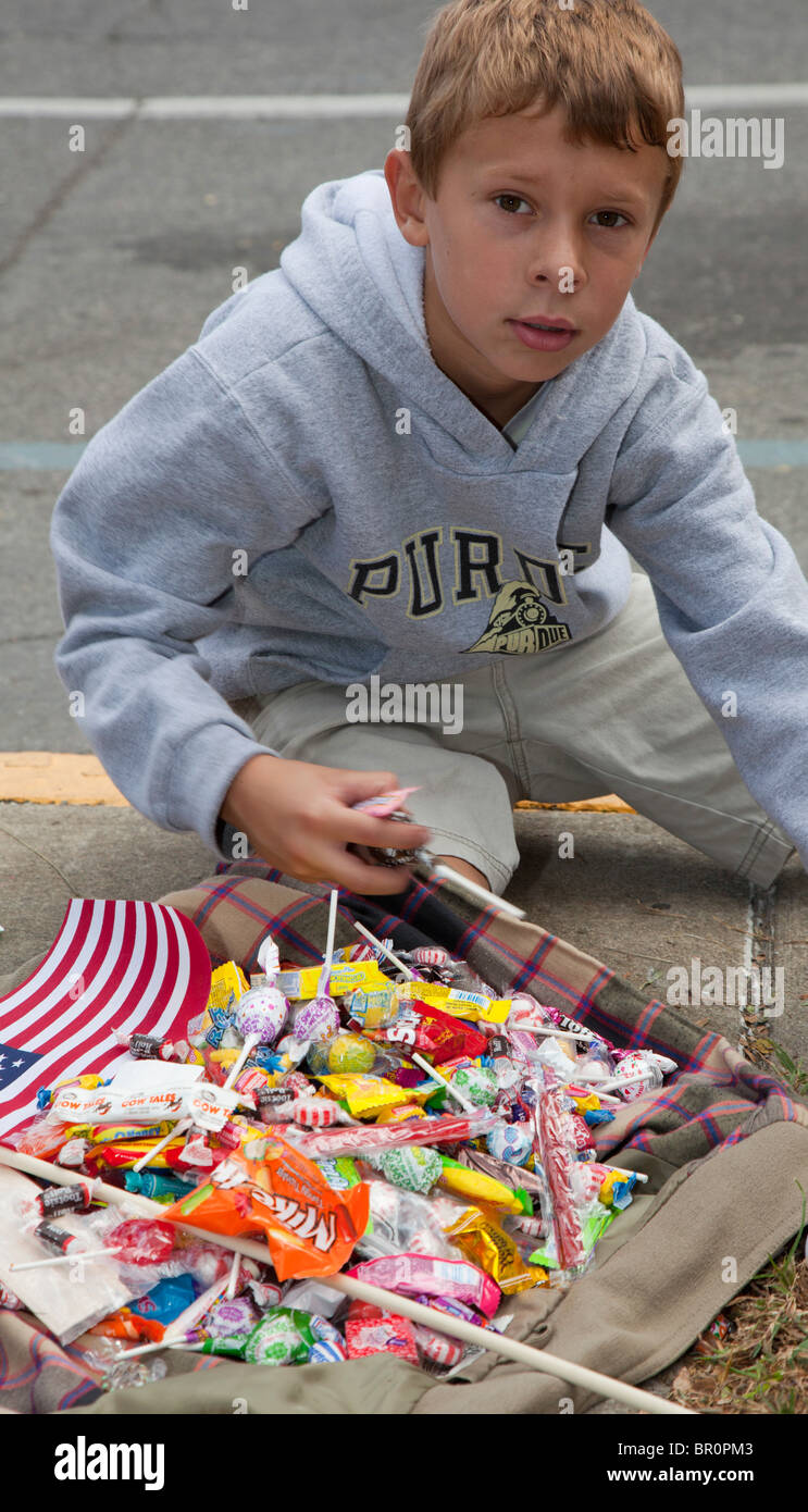 Child with Candy Collected at Labor Day Parade Stock Photo - Alamy