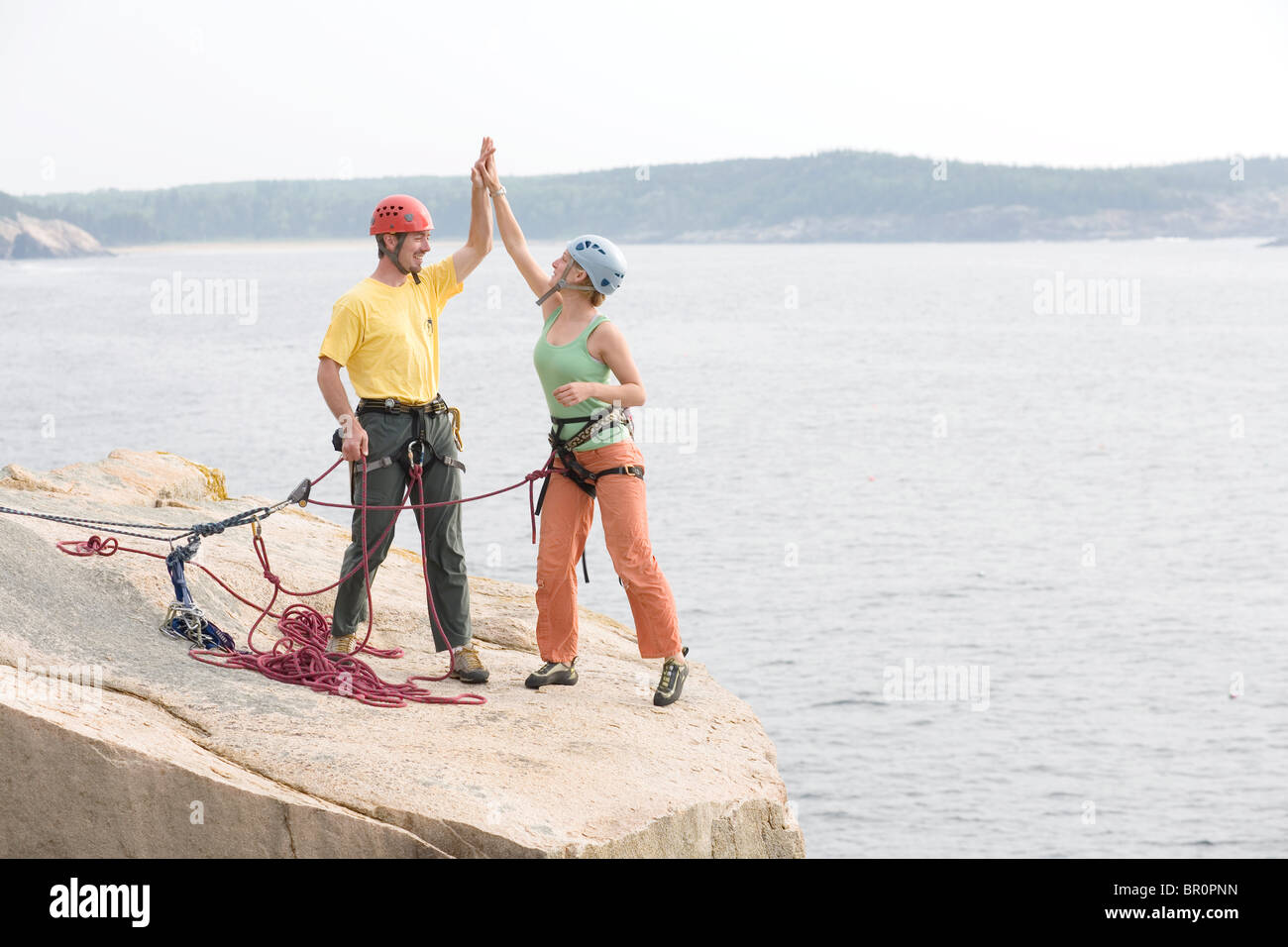 Rock Climbing on oceanside cliffs, Maine Stock Photo - Alamy