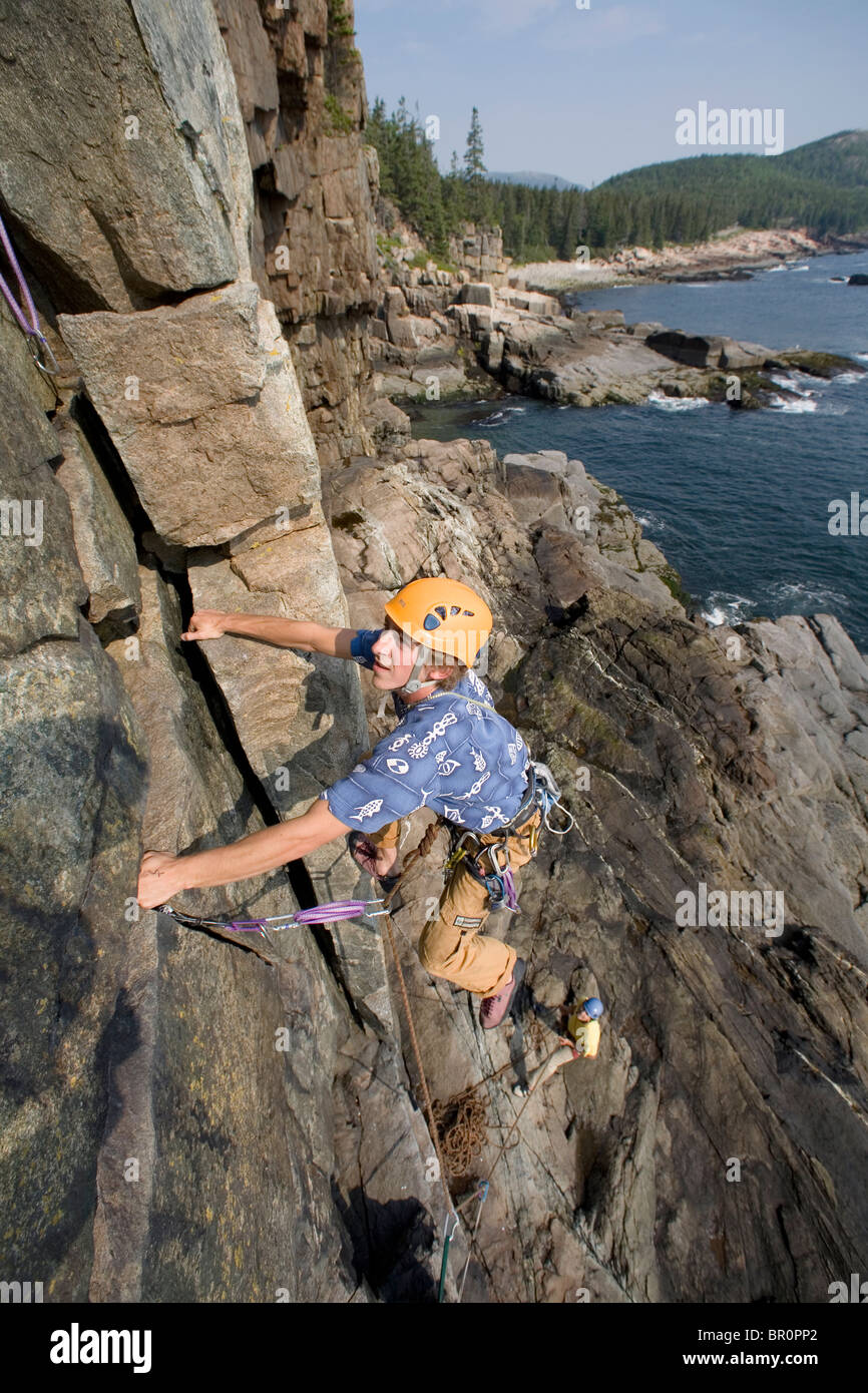 Rock Climbing on oceanside cliffs, Maine Stock Photo - Alamy