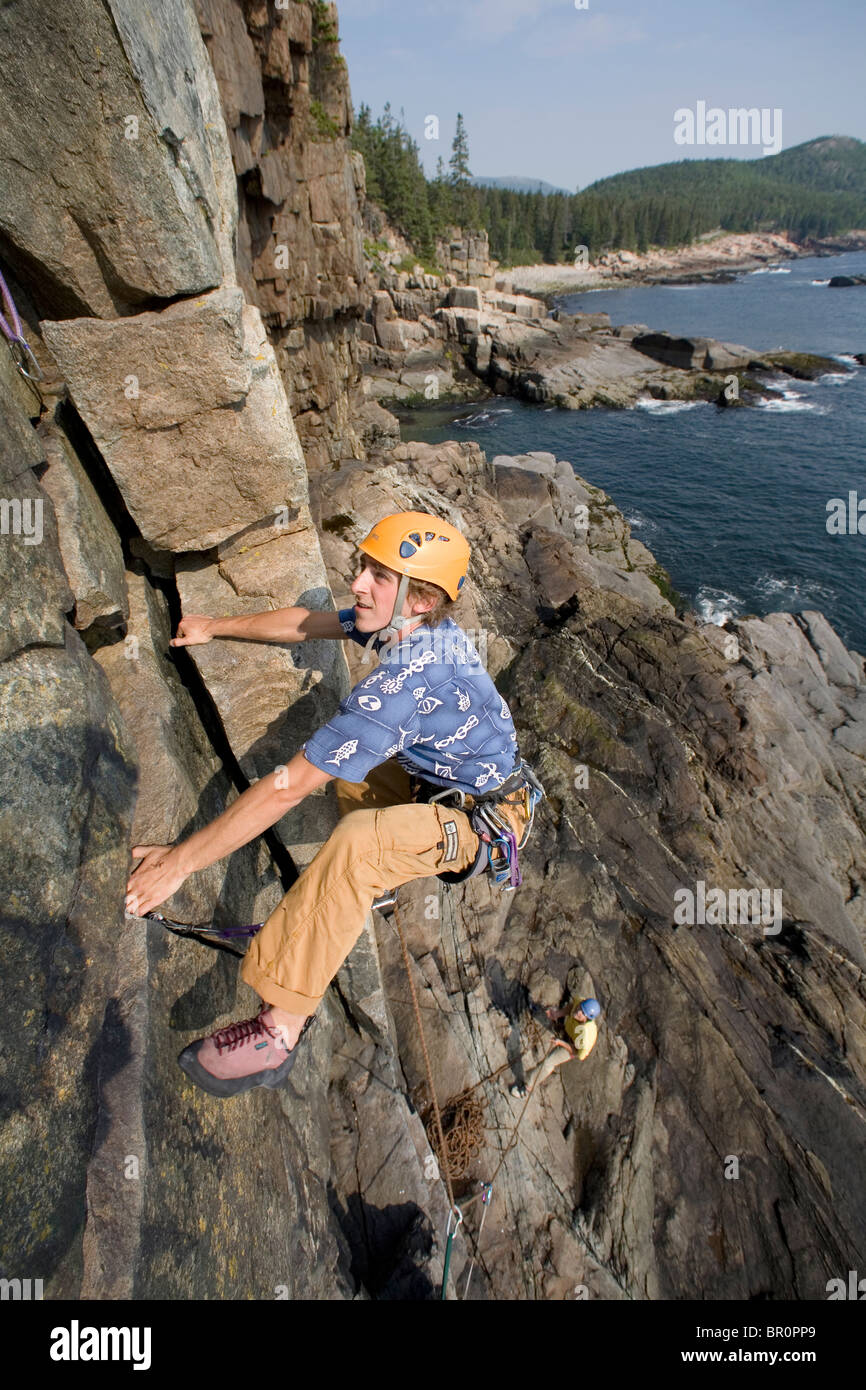 Rock Climbing on oceanside cliffs, Maine Stock Photo - Alamy