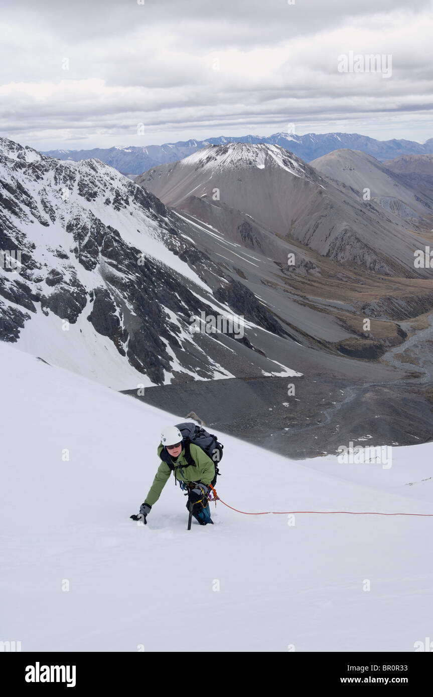New Zealand, South Island, Arrowsmith Range. Katie Damby mountaineering ...