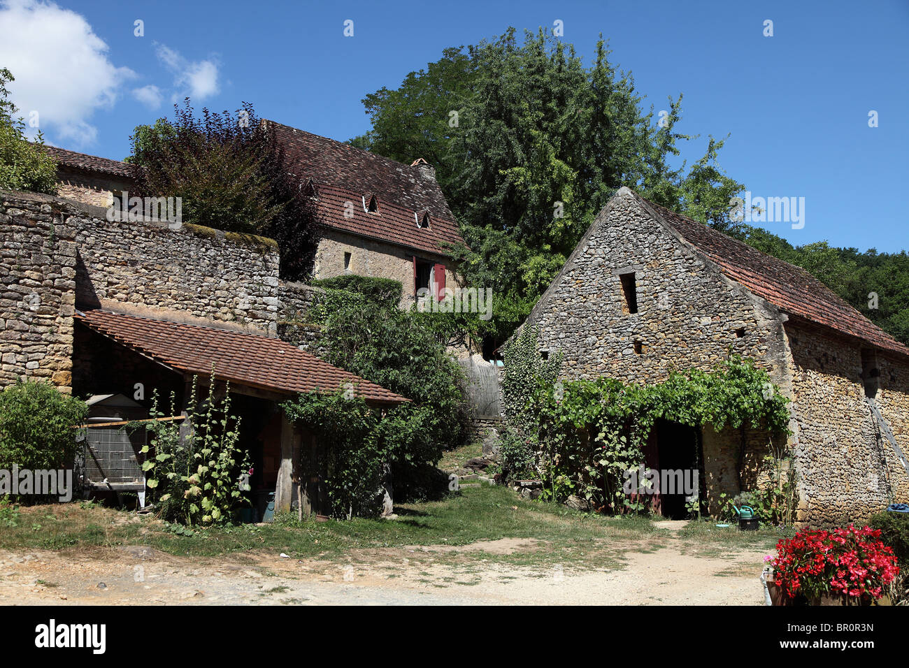 General view of farm buildings in village of Urval Dordogne France ...