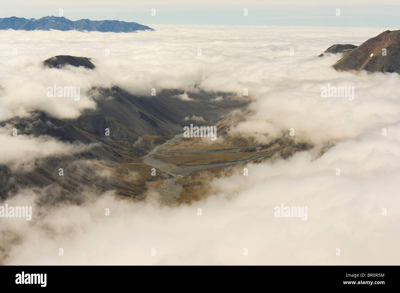 New Zealand, South Island, Arrowsmith Range. Morning fog over Ashburton ...