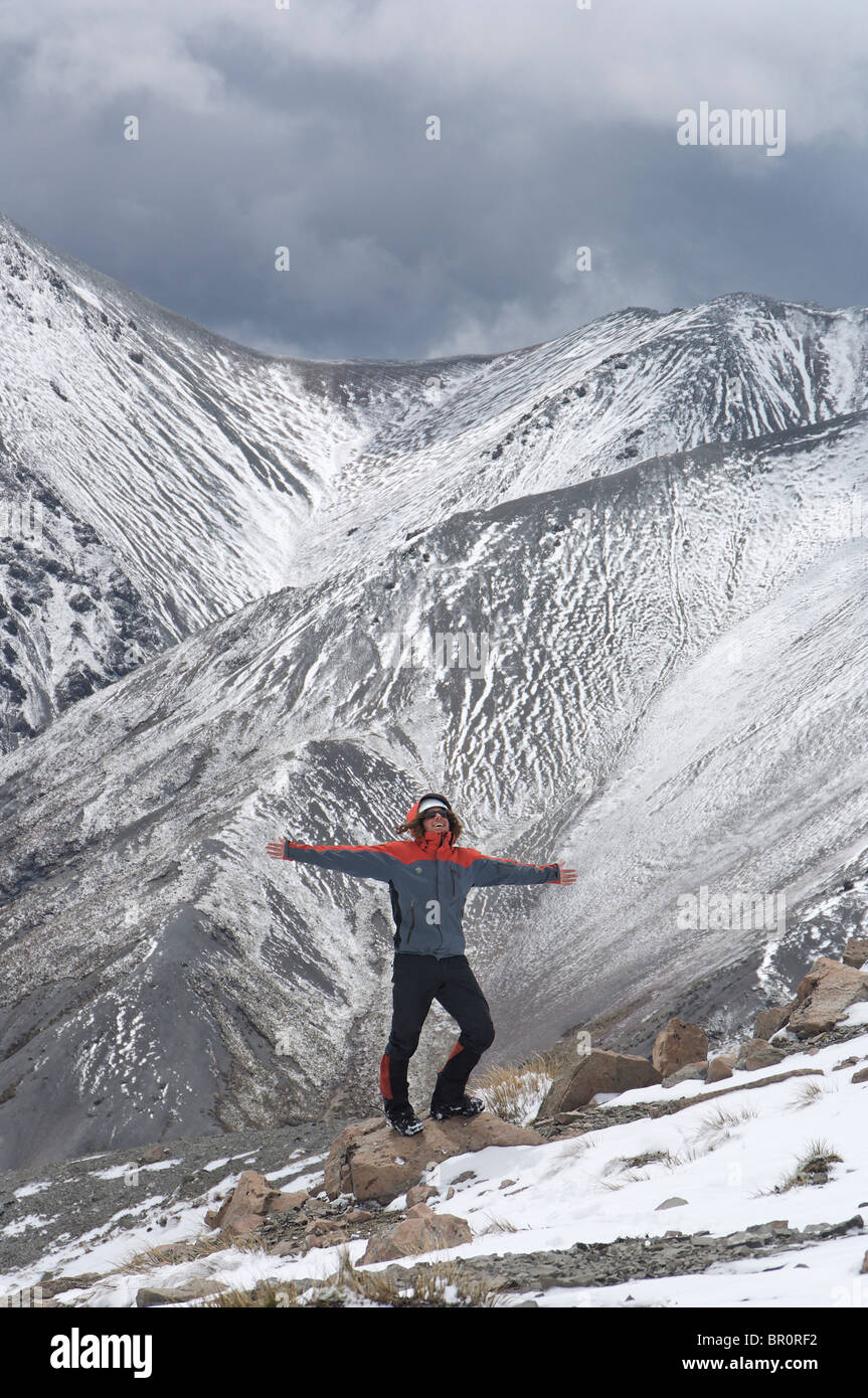 New Zealand, South Island, Arrowsmith Range. Scott Kossow in a pass ...