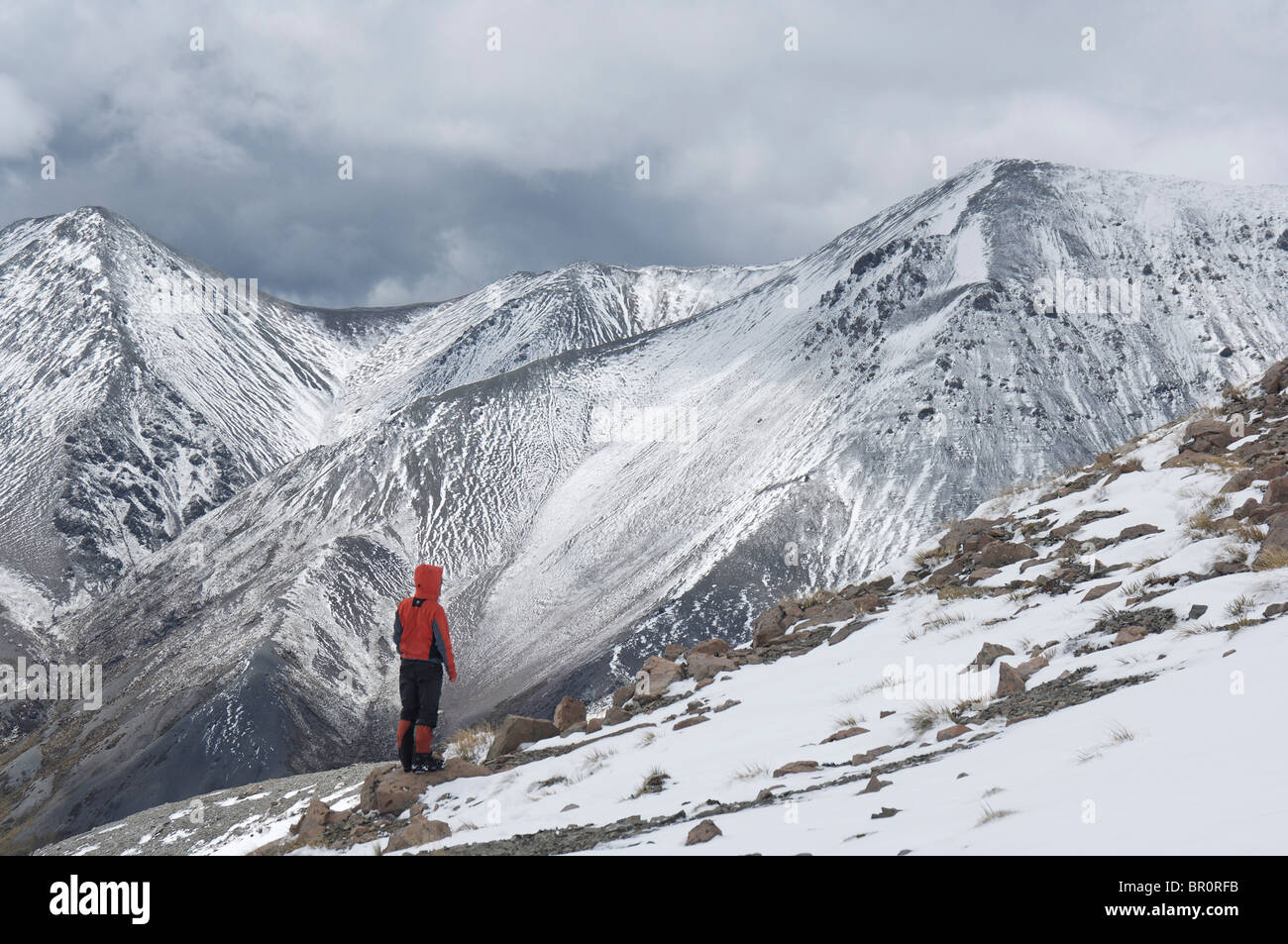 New Zealand, South Island, Arrowsmith Range. Scott Kossow in a pass ...