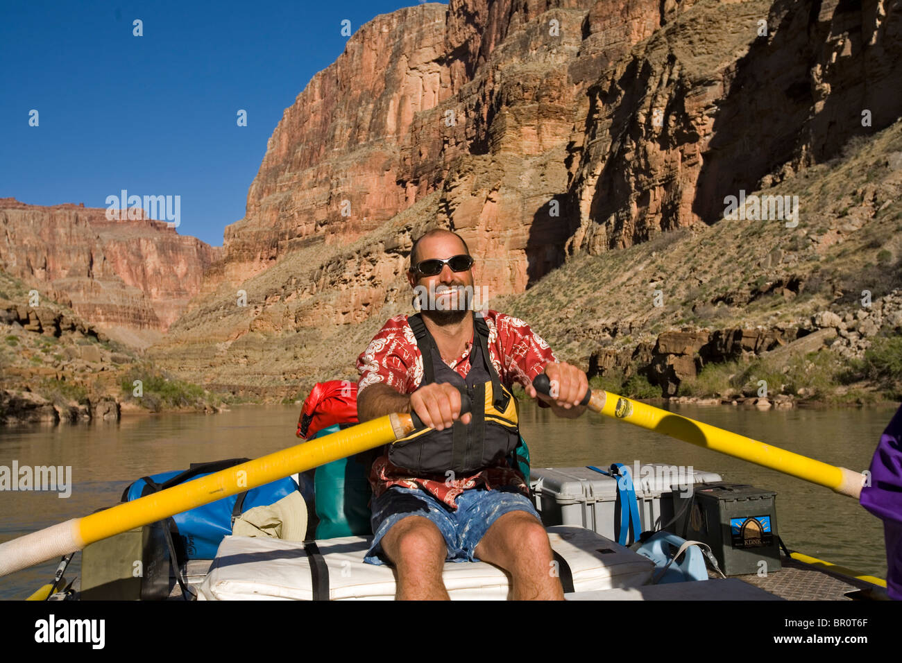 Man rowing raft down the Grand Canyon, Arizona Stock Photo - Alamy