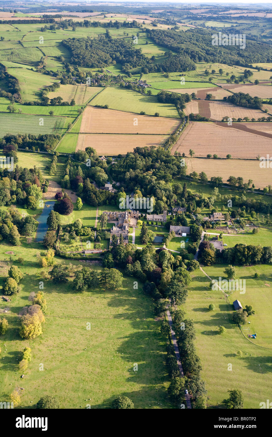 An aerial view of the Cotswold village of Stanway, Gloucestershire from ...