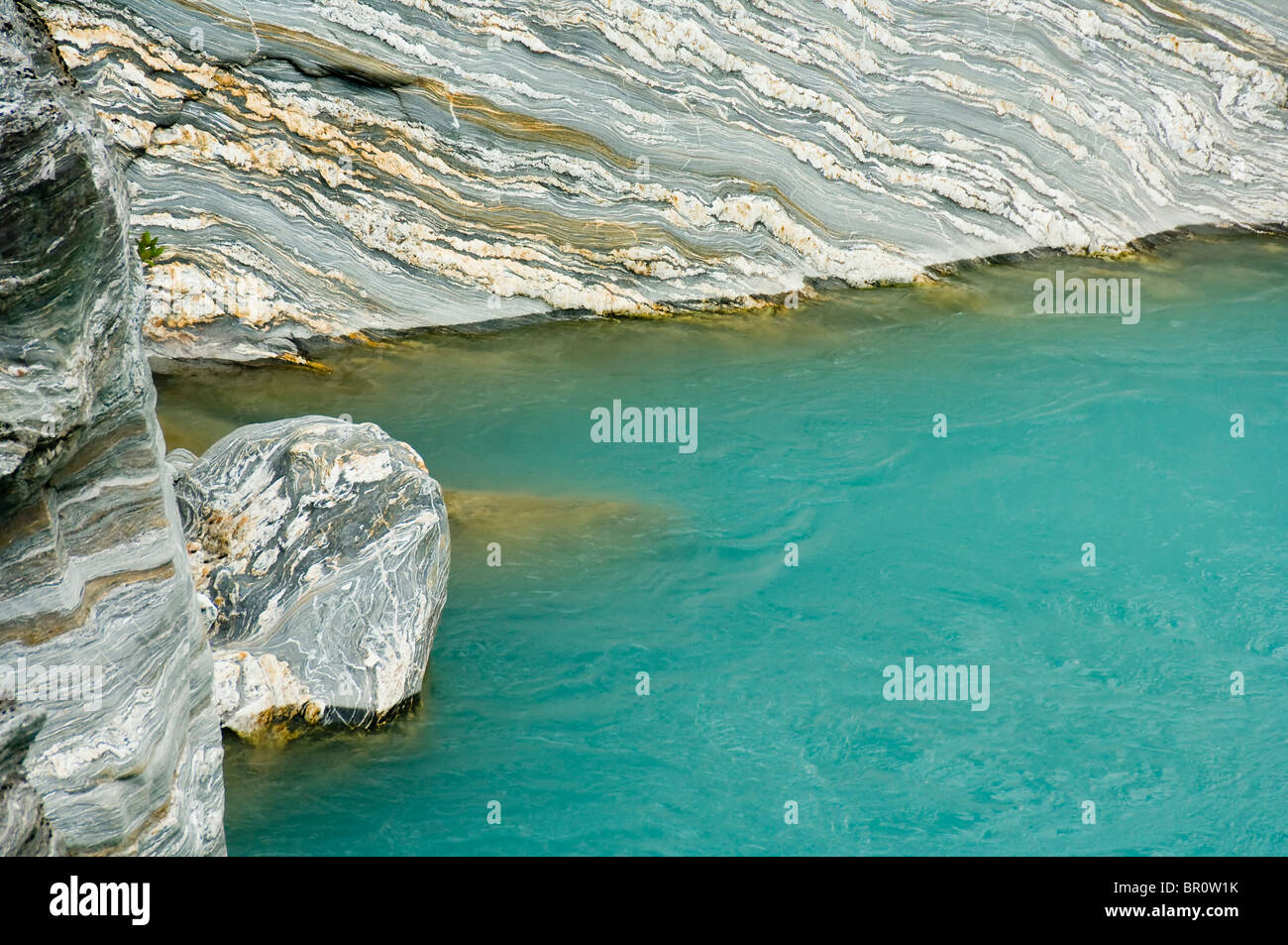 New Zealand, South Island, Westland National Park. Water polished ...