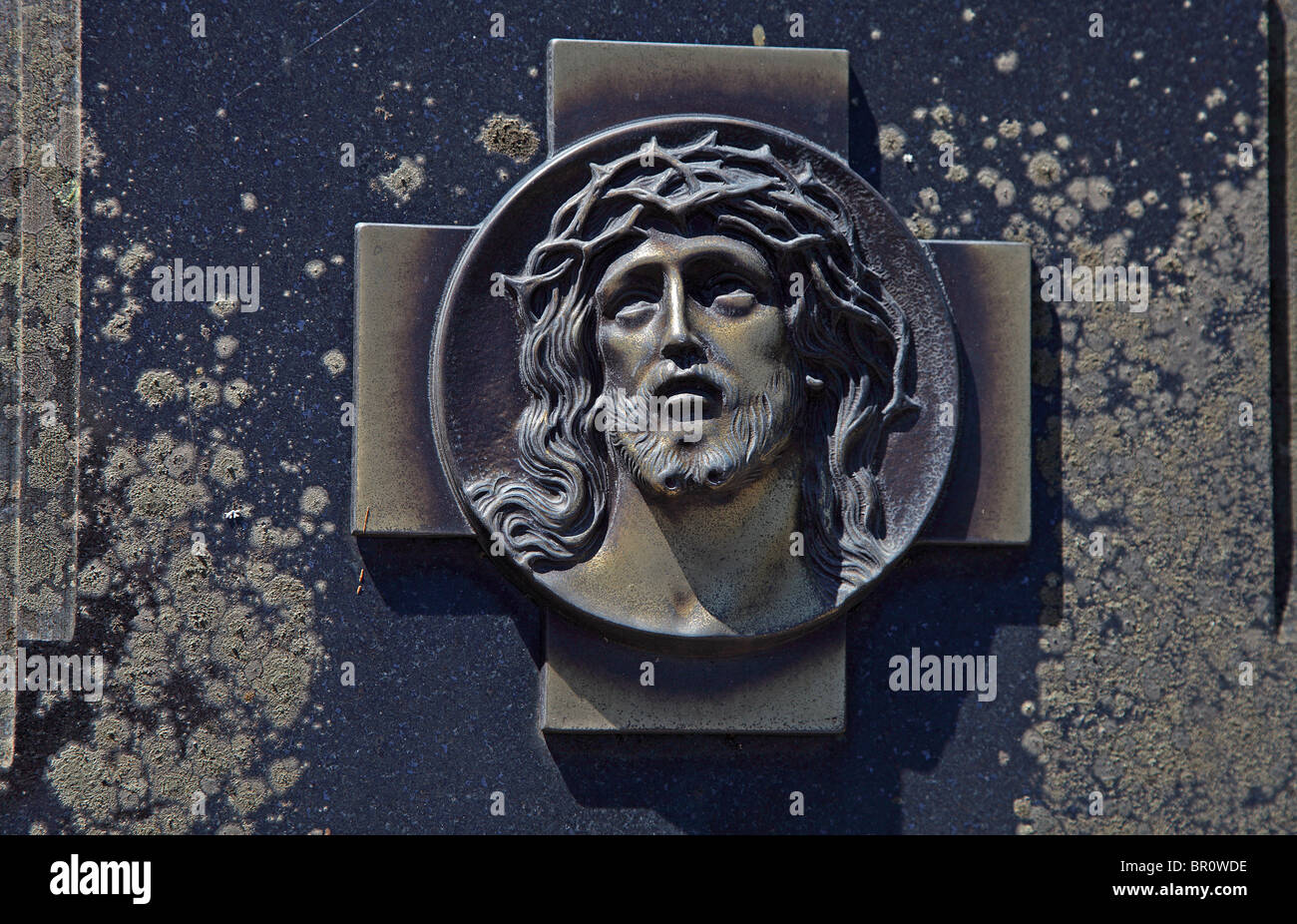 Cross with Jesus in portrait Stock Photo - Alamy