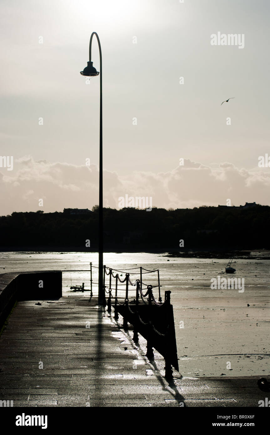 A lamppost on a sea wall Stock Photo - Alamy