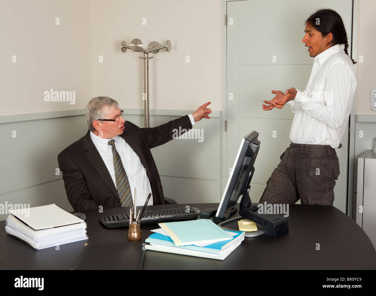 Angry director firing one young hi-res stock photography and images - Alamy