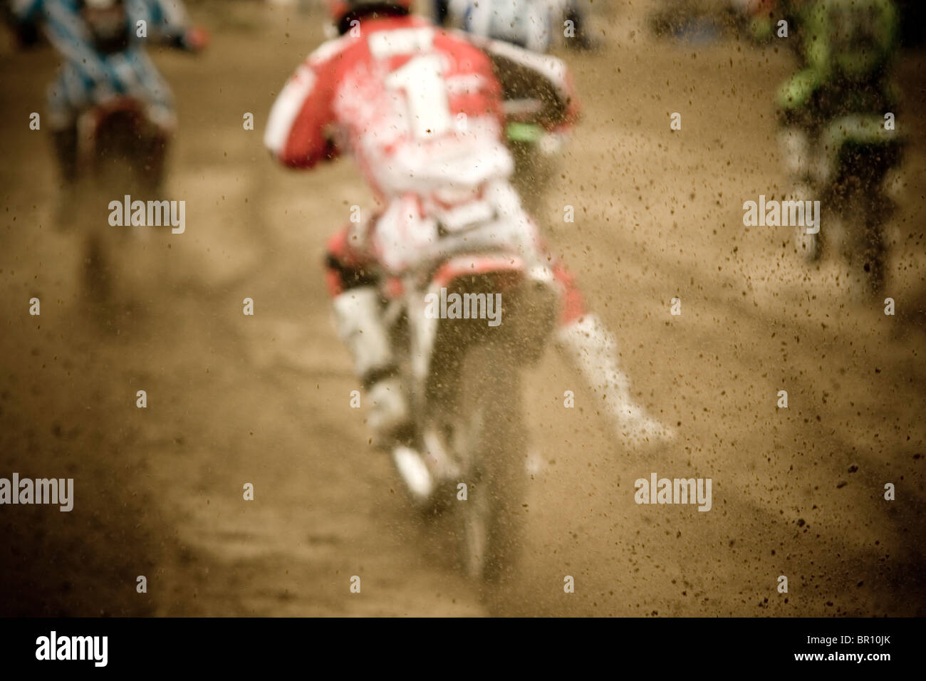 Motocross racers accelerating from the start line in Toronto, Ontario ...