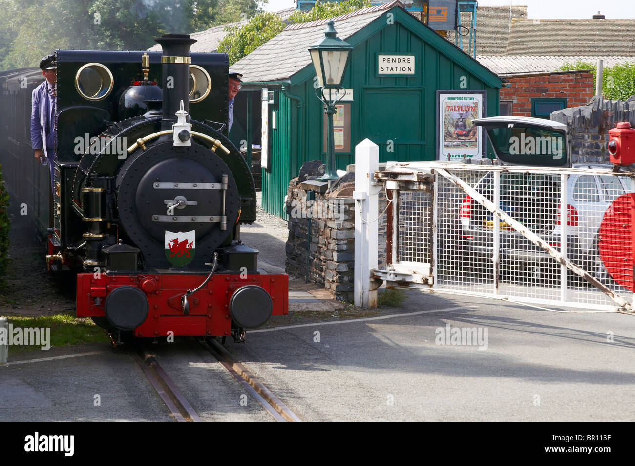 Train on the narrow gauge Talyllyn Railway at the level crossing at ...