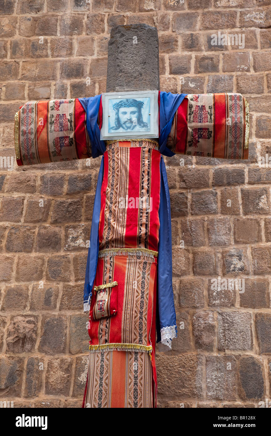 Stone cross decorated with fabrics, Cusco, Peru, South America Stock ...