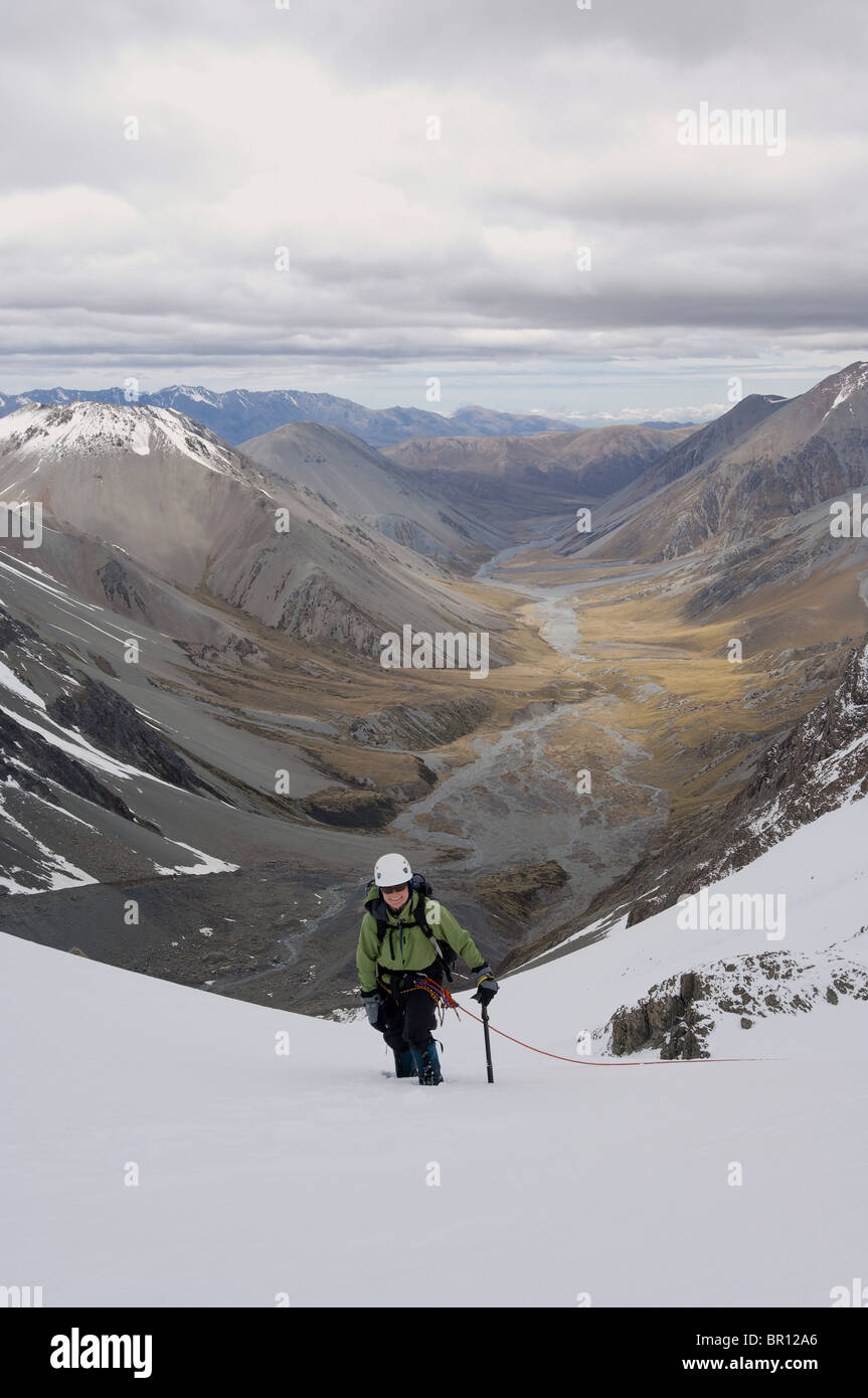 New Zealand, South Island, Arrowsmith Range. Katie Damby mountaineering ...
