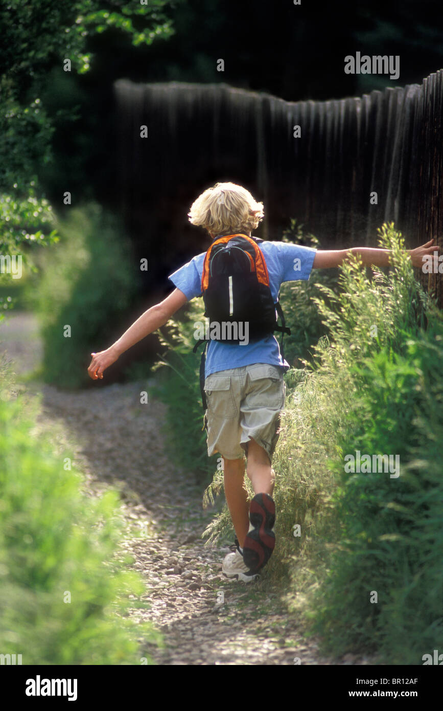 Child dragging tree High Resolution Stock Photography and Images - Alamy