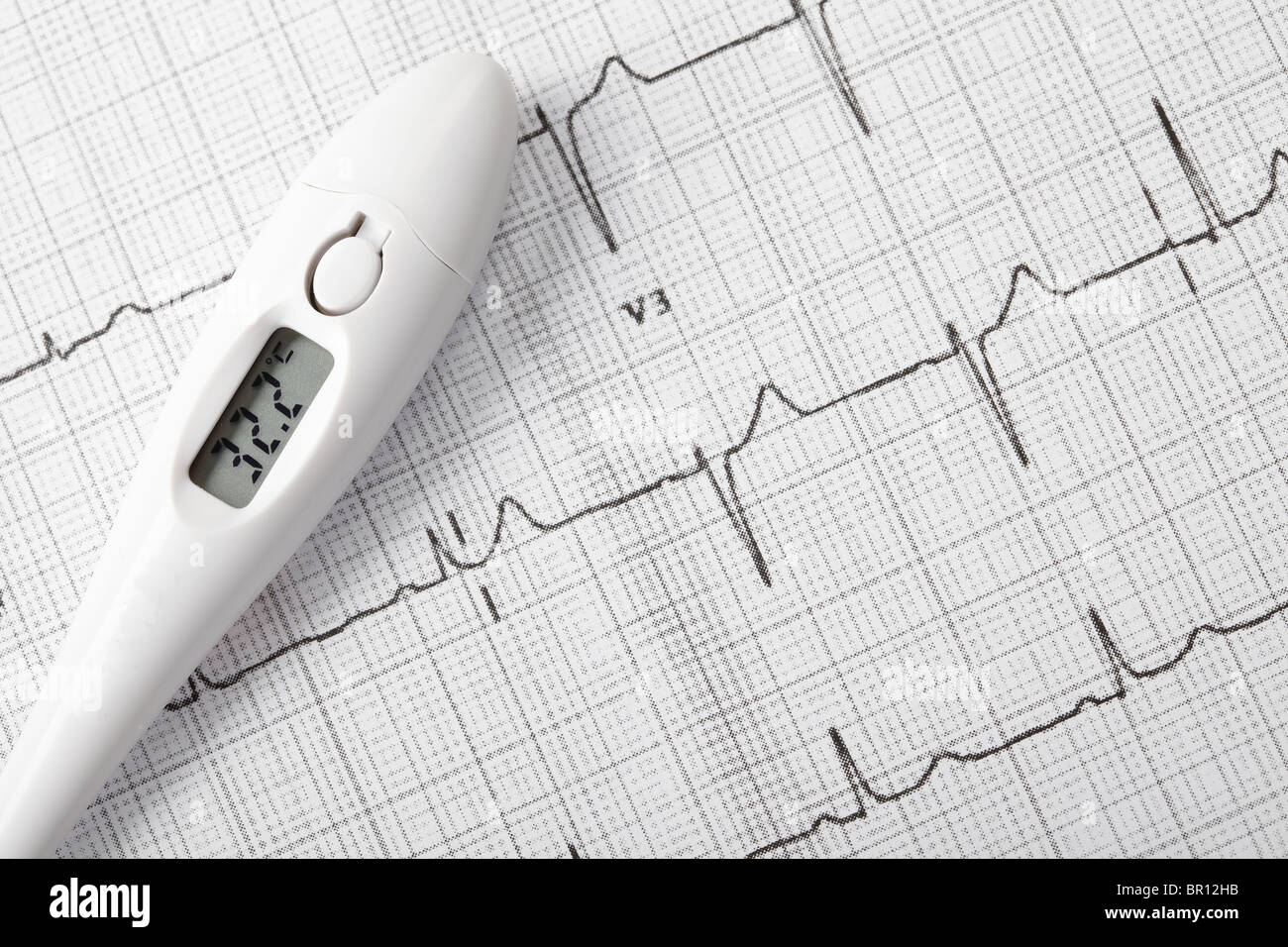 thermometer on the cardiogram Stock Photo - Alamy