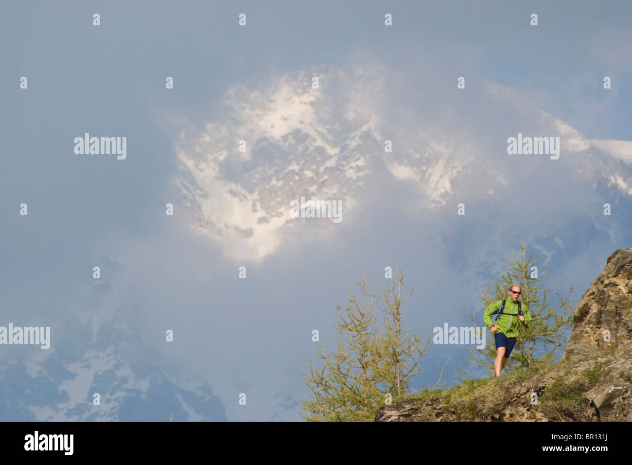 A man trail running in the French Alps near Chamonix Stock Photo - Alamy