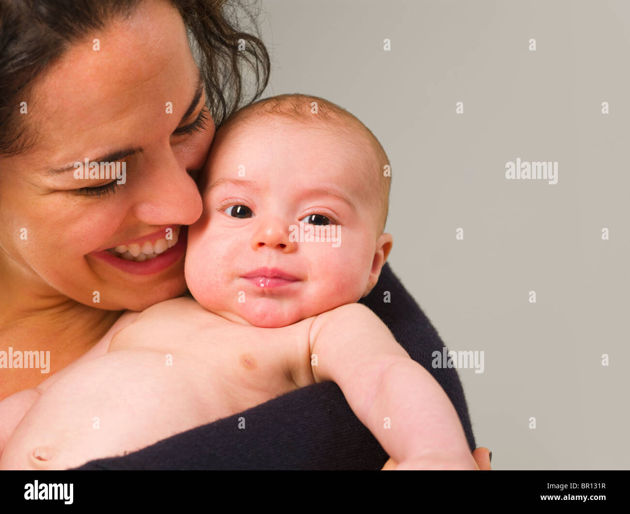 Mother holding newborn baby Stock Photo - Alamy