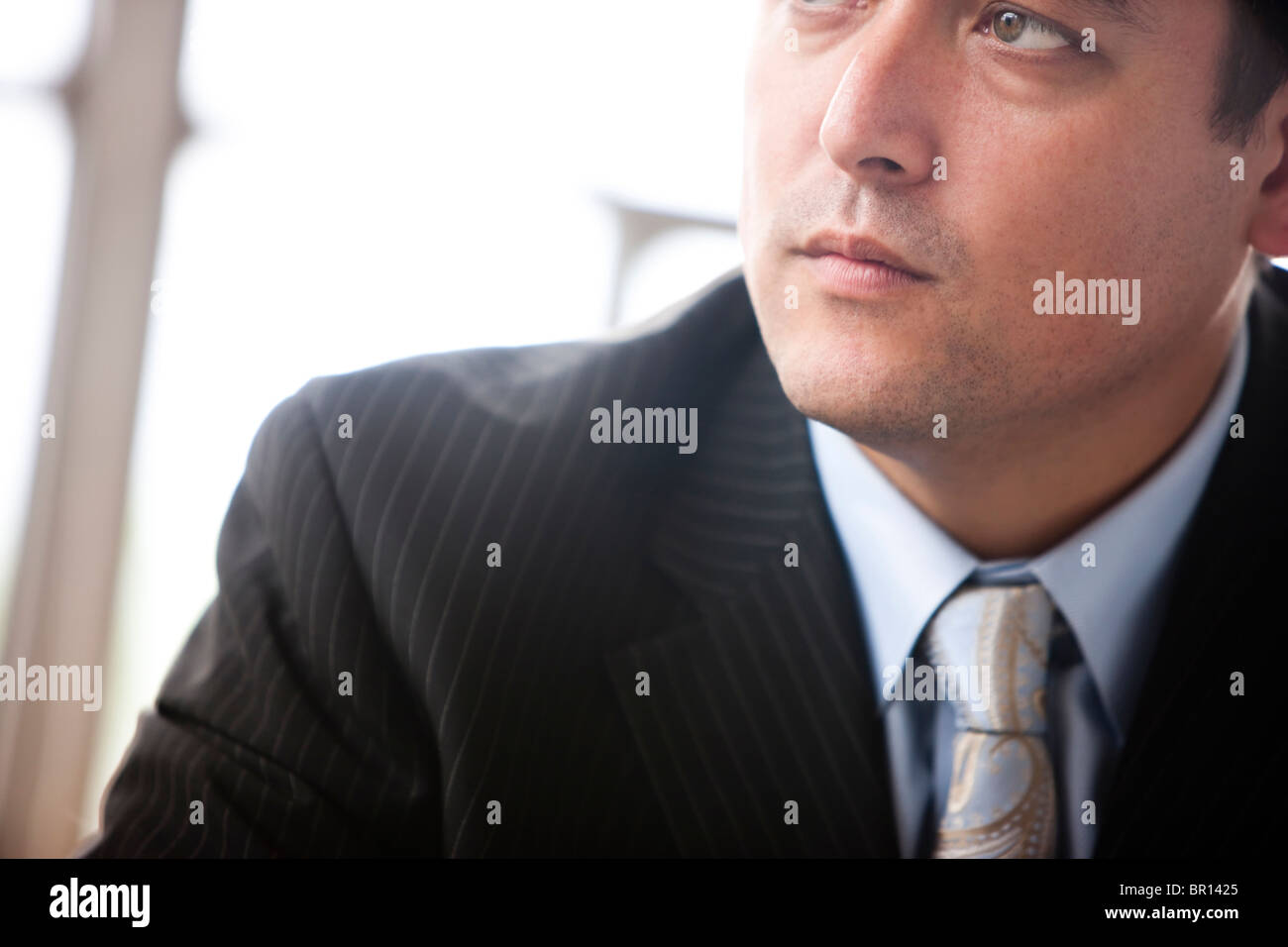 Portrait of mixed race businessman Stock Photo - Alamy