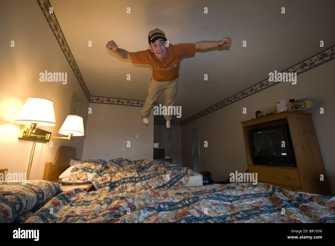 Hotel bed jump hi-res stock photography and images - Alamy