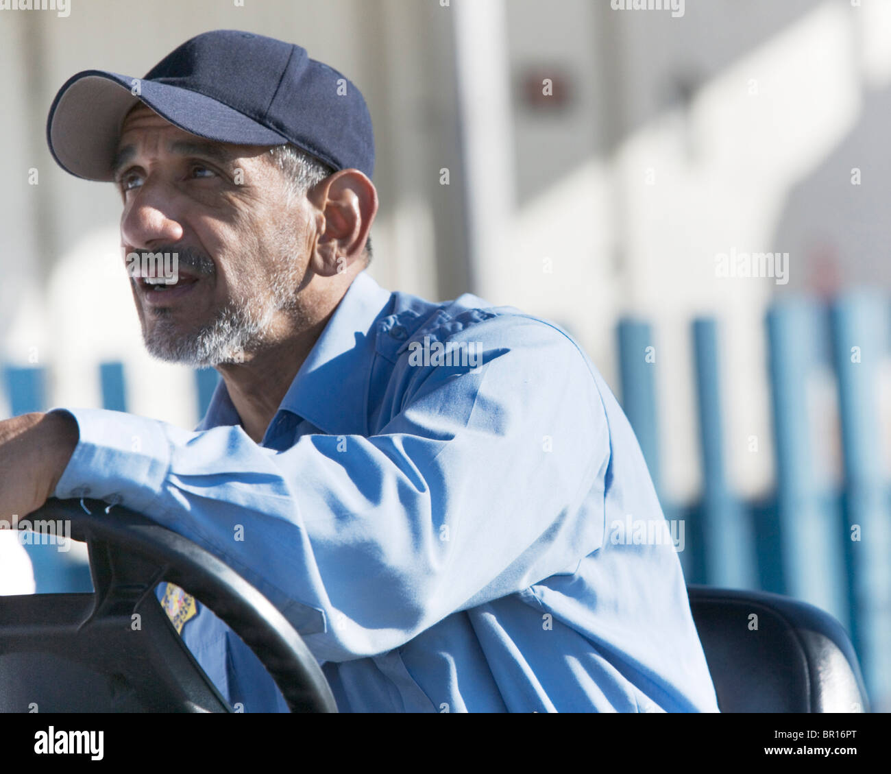 Hispanic man steering vehicle hi-res stock photography and images - Alamy
