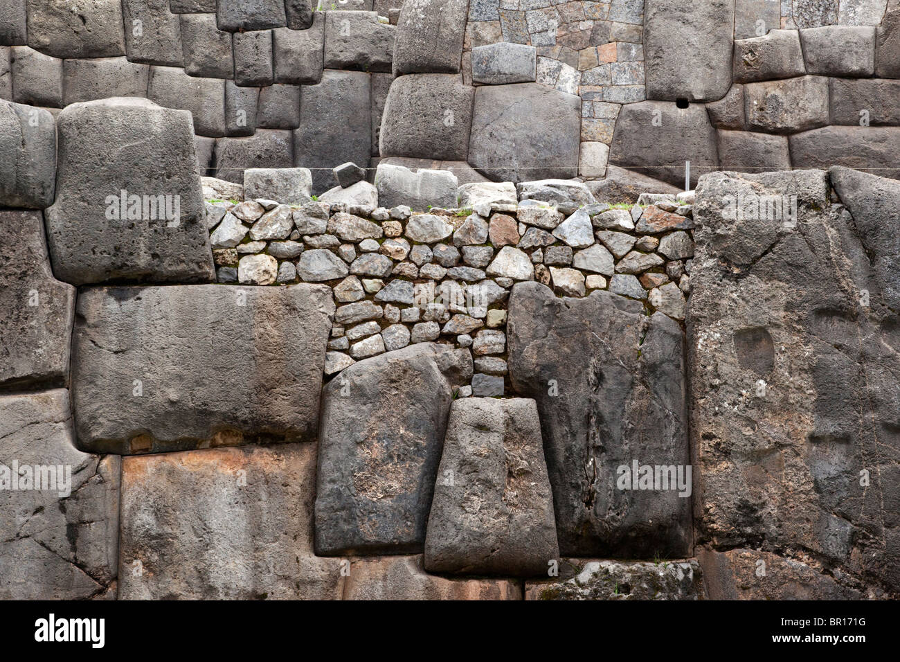 Ancient stone wall in the historic city of Sacsayhuaman near Cusco ...