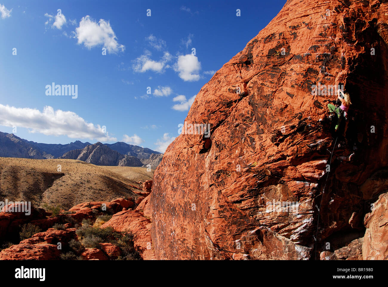 Woman rock climbing at Red Rocks National Recreation Area, Las Vegas ...