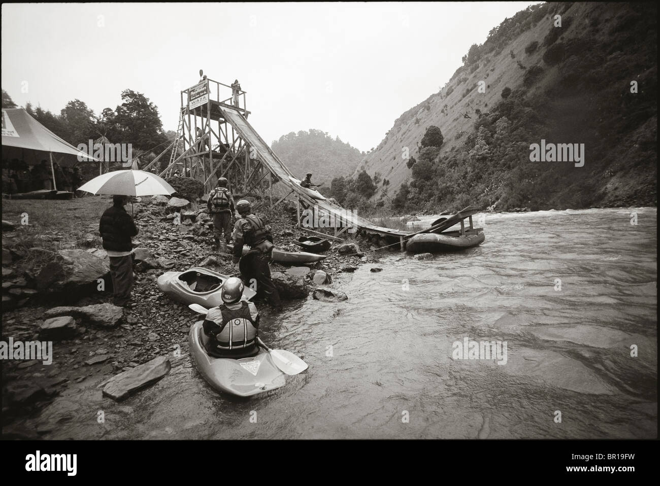 A Kayak Big Air Contest in which kayakers launch themselves off a ramp ...