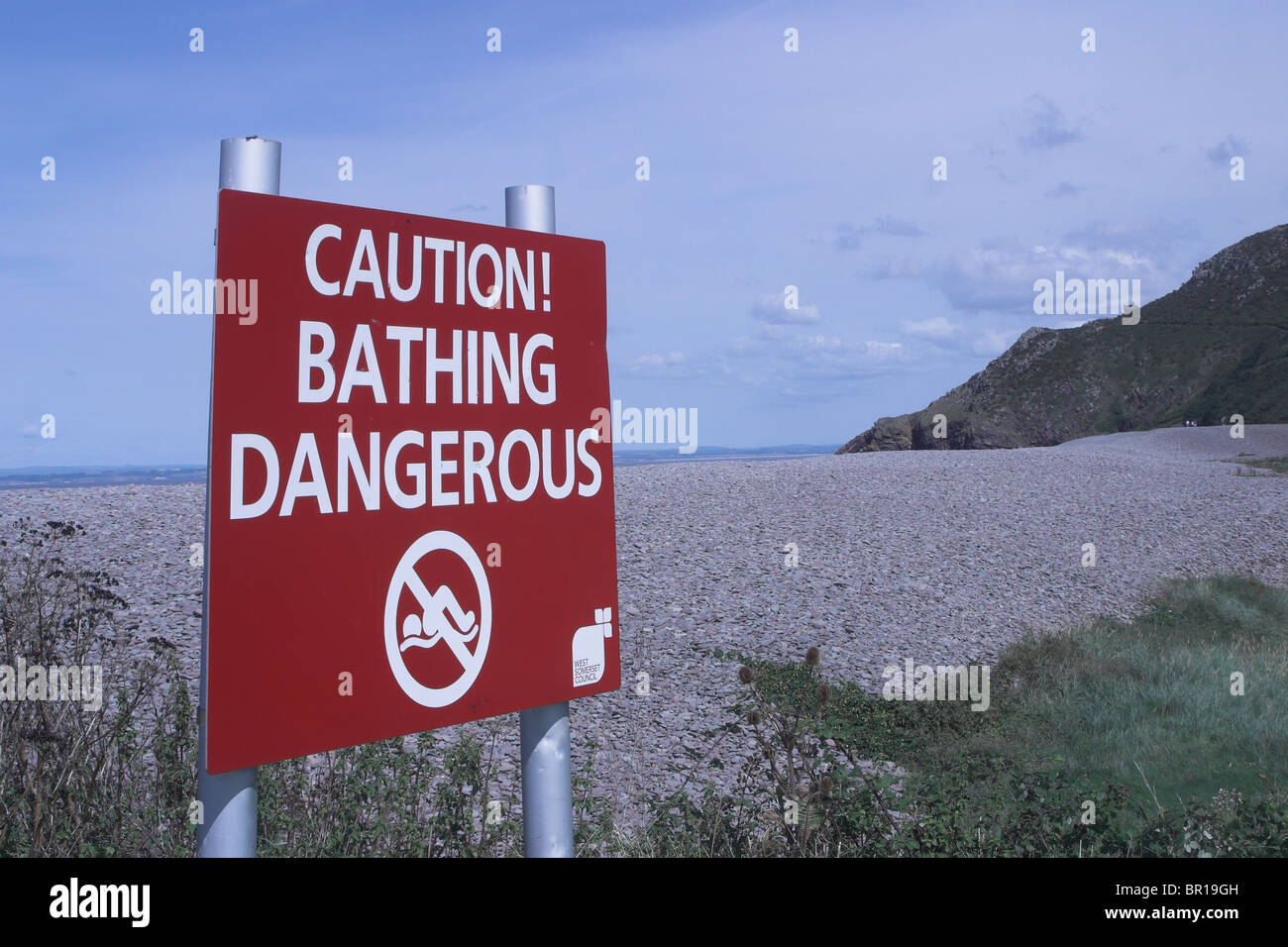 Caution, dangerous bathing sign at an entrance to Bossington Beach ...
