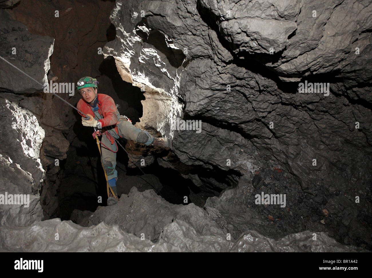 Cave explorer ascends a rope pitch in a cave in the White Mountains on ...