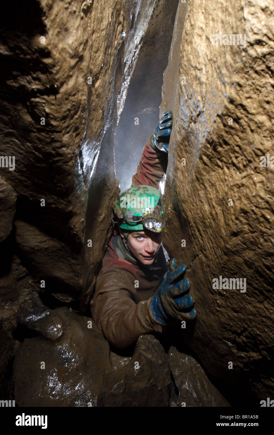 Narrow cave passage cave explorer hi-res stock photography and images ...