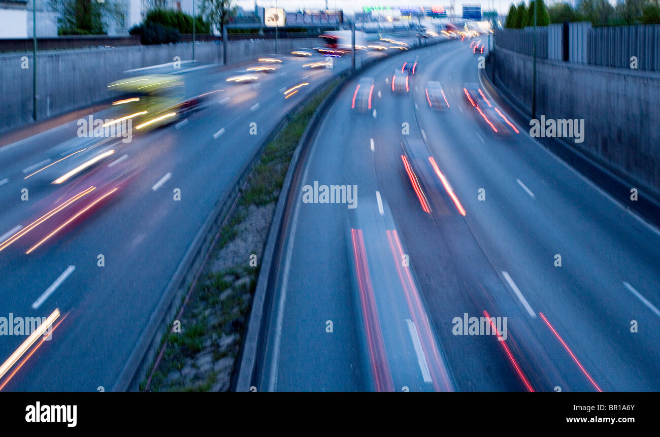 motorway (highway) with cars moving at speed in the suburbs of Paris ...