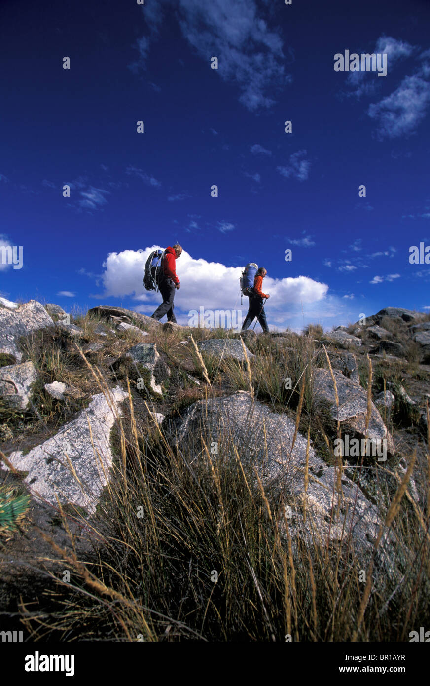 Two men hiking on a ridge in Cordillera Blanca, Peru Stock Photo - Alamy