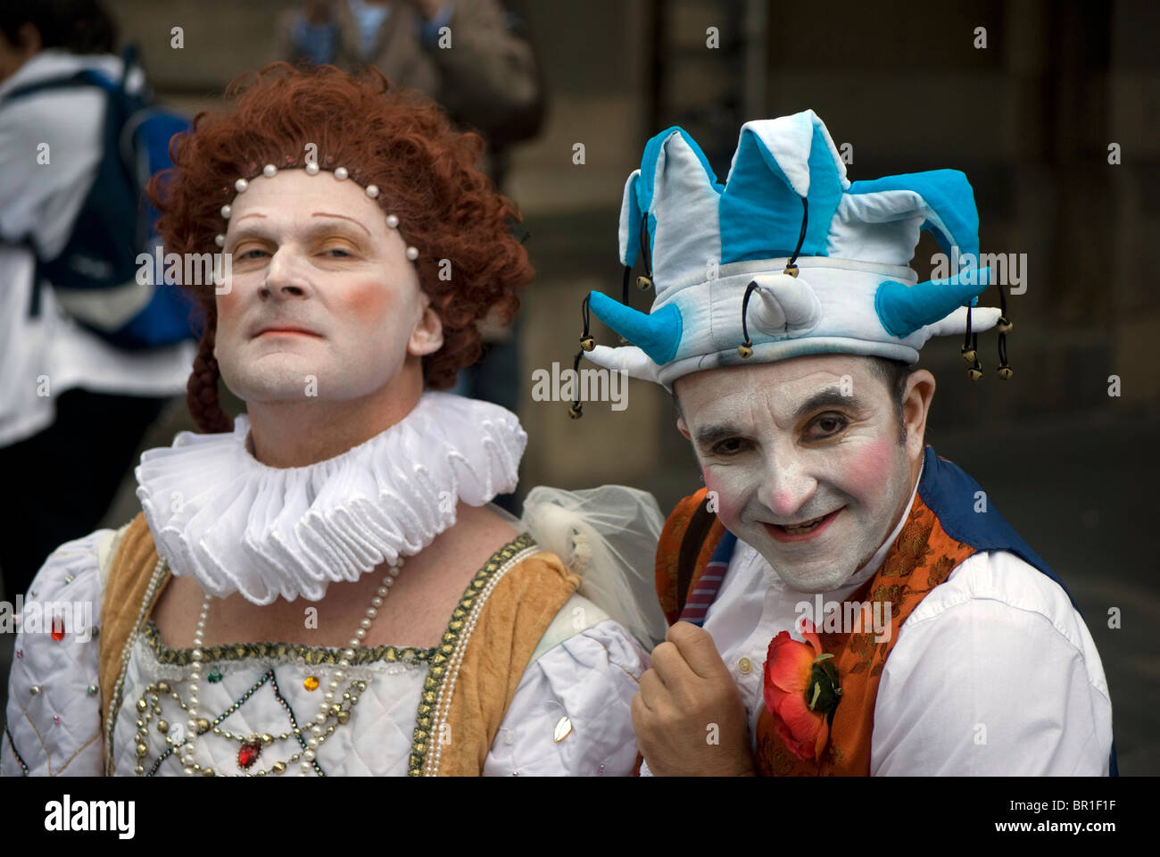 Man dressed as a queen and his/her jester promoting a Fringe show in ...