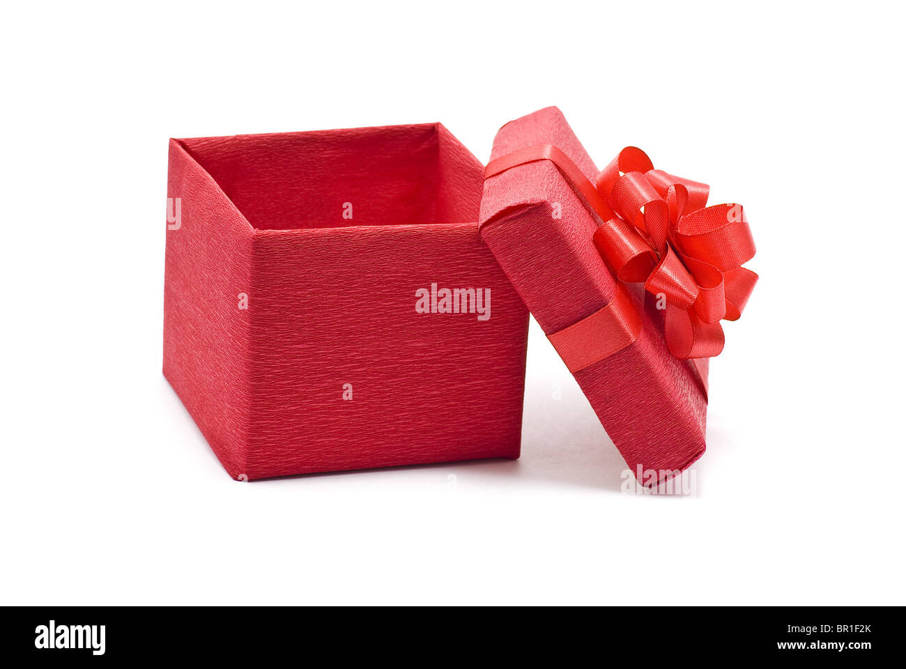 Open red gift box with bow Stock Photo - Alamy