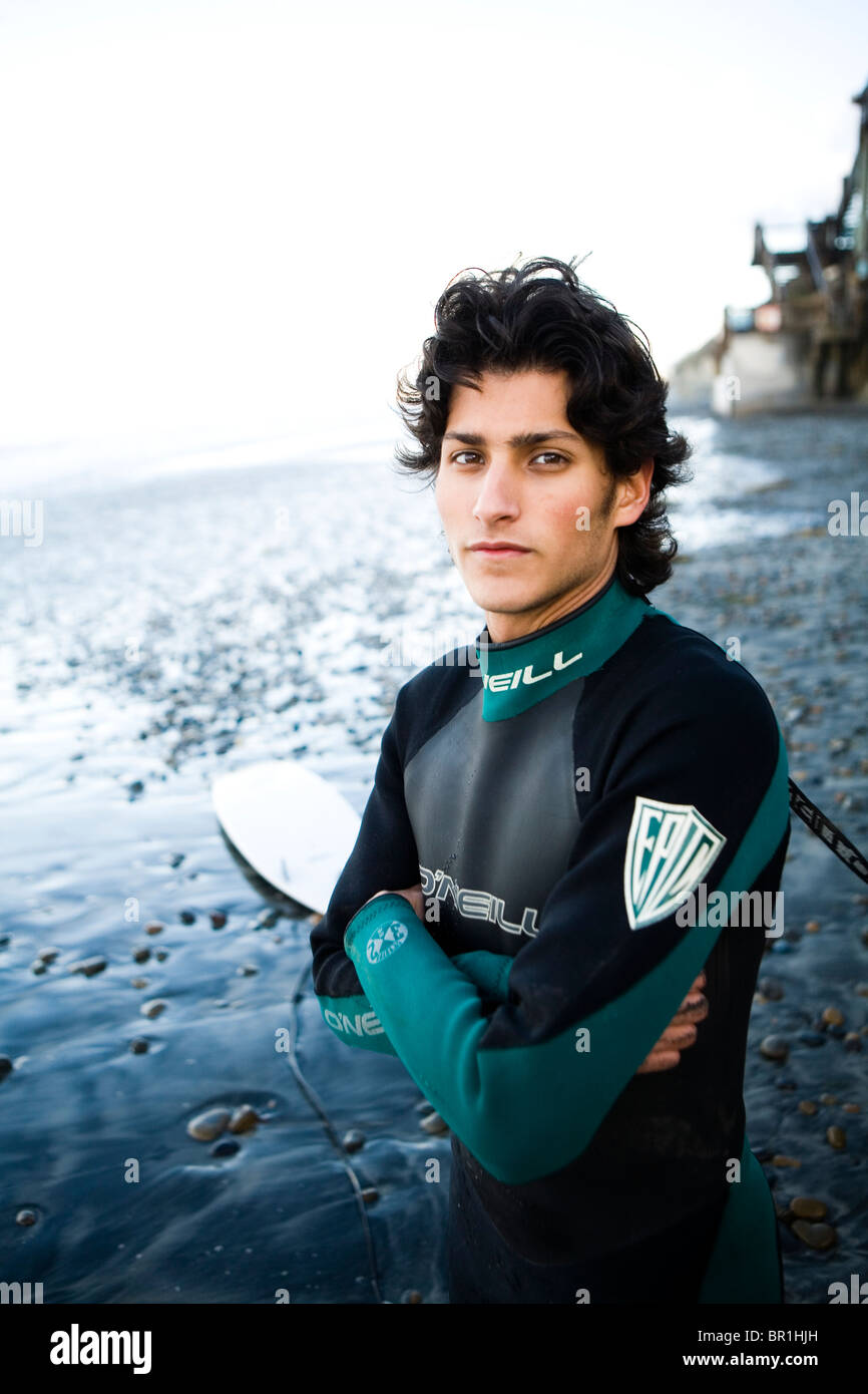 Surfer poses for the camera in San Diego, CA Stock Photo - Alamy