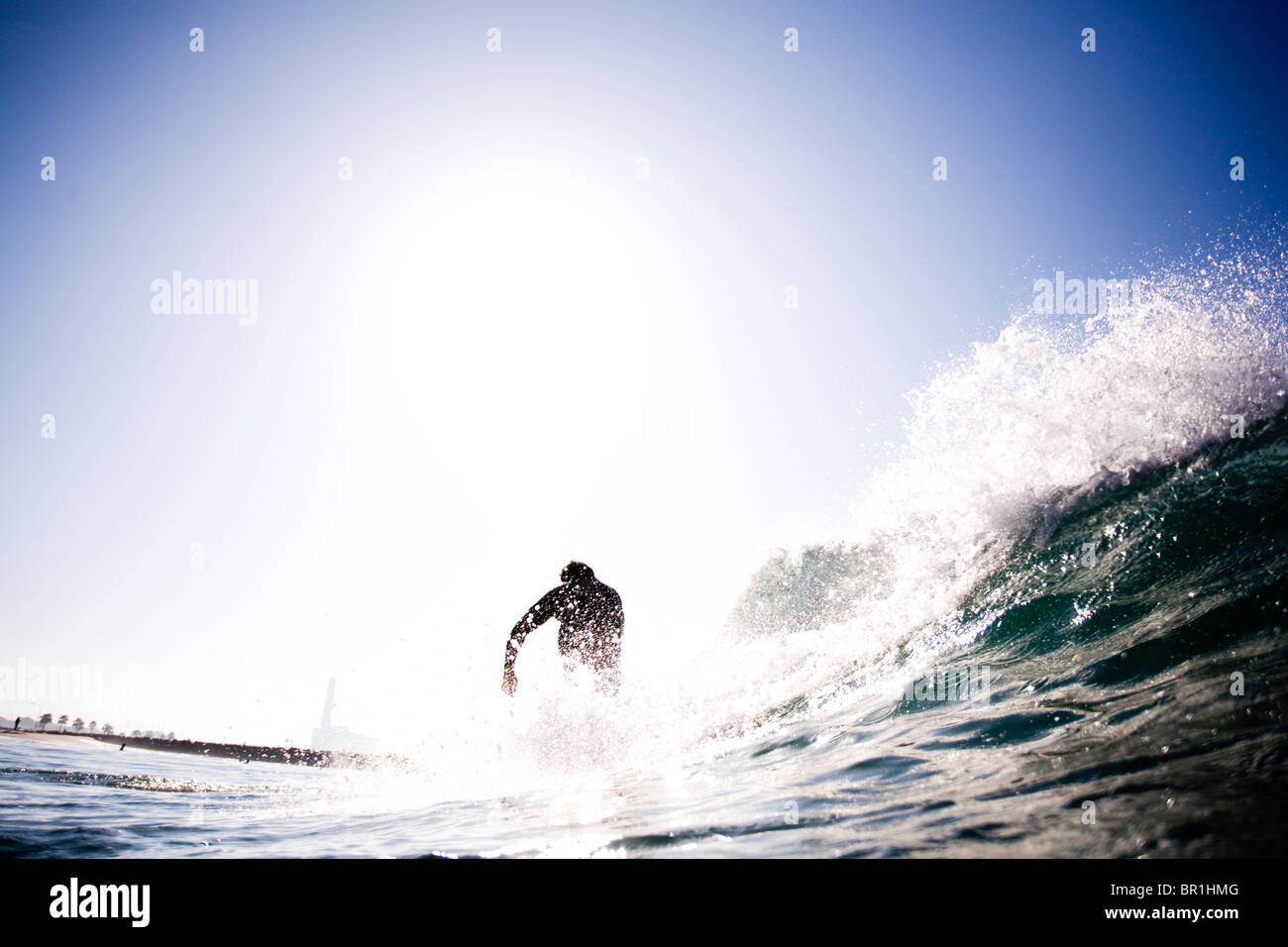 A surfer takes off on a wave in Carlsbad, CA Stock Photo - Alamy