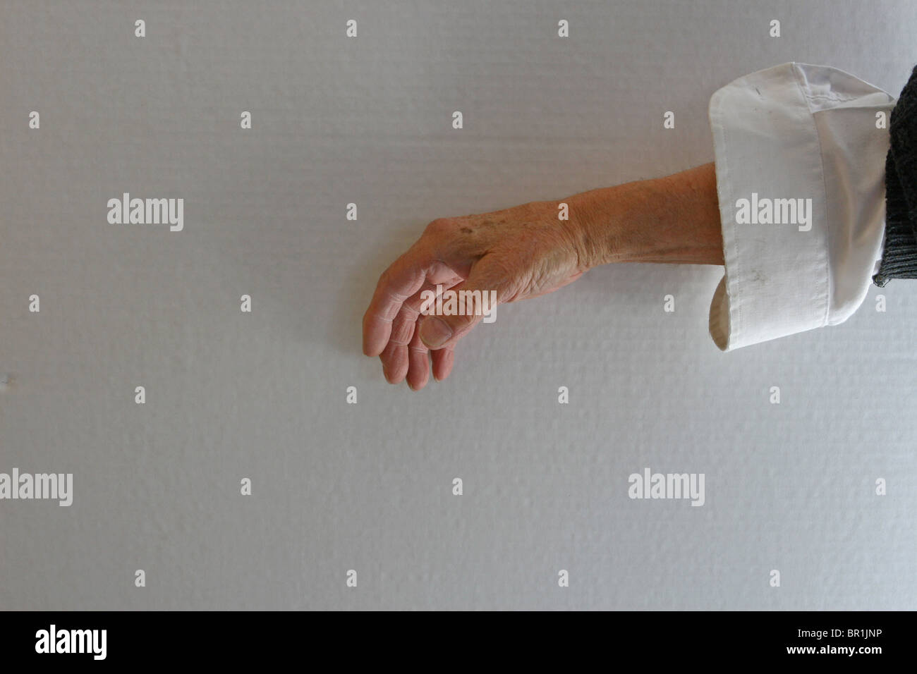 Hand cuff and hand hi-res stock photography and images - Alamy